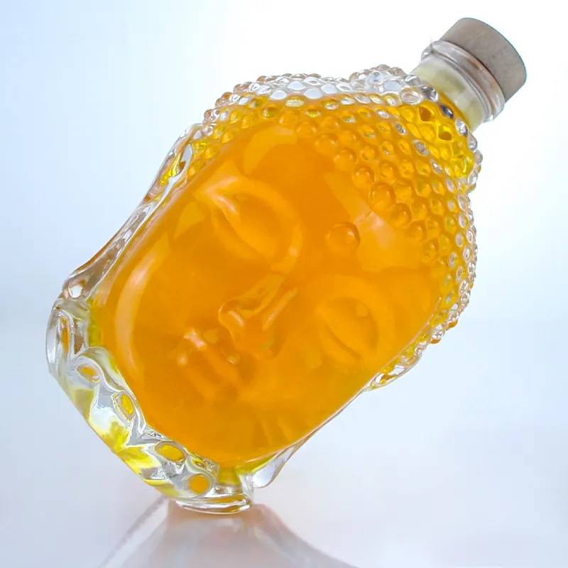 Customized buddha shaped 700ml 750ml clear vodka rum liquor glass ...